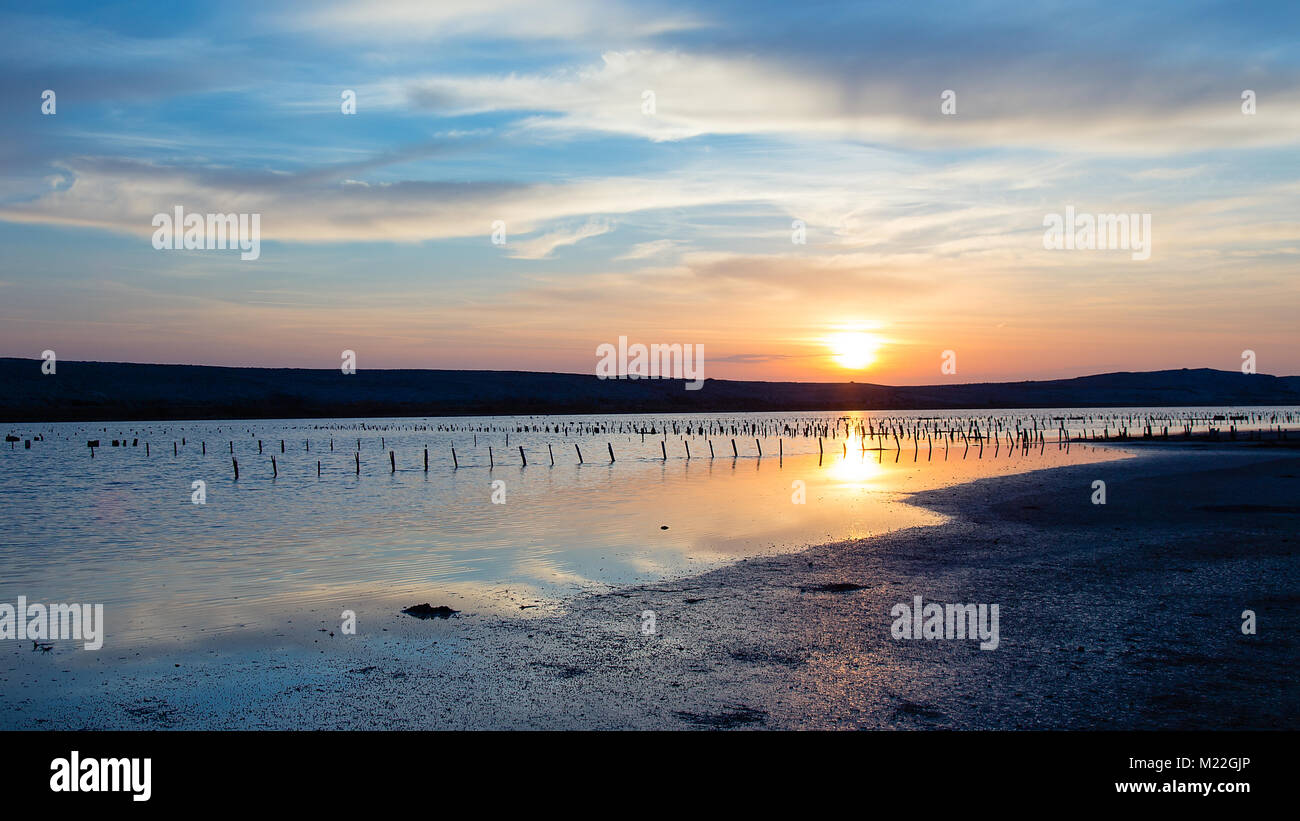 Antique Saline with beautiful sunrise - sea landscape - Salt production ...