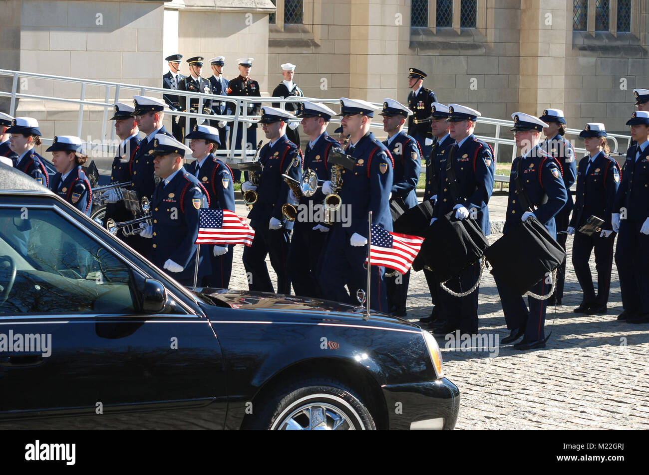 The U.S. Coast Guard Band marches during the state funeral service held ...
