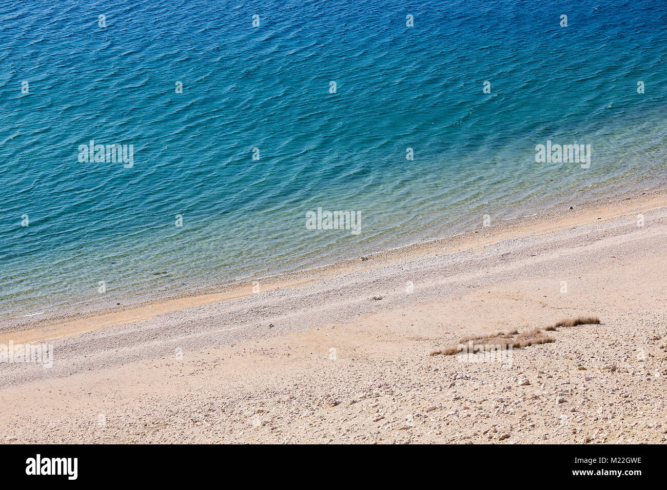 Beautiful sand beach with turquoise blue water - sea water background ...