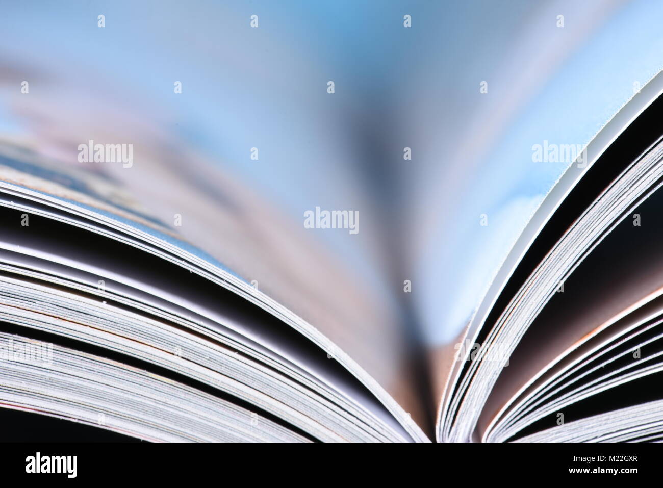 Opened book close-up Stock Photo - Alamy