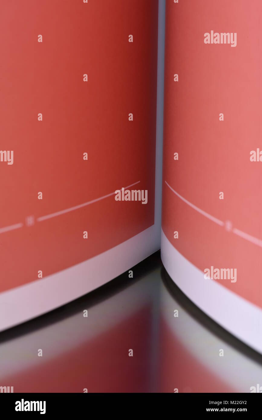 Blank open book on metal table with reflection Stock Photo - Alamy