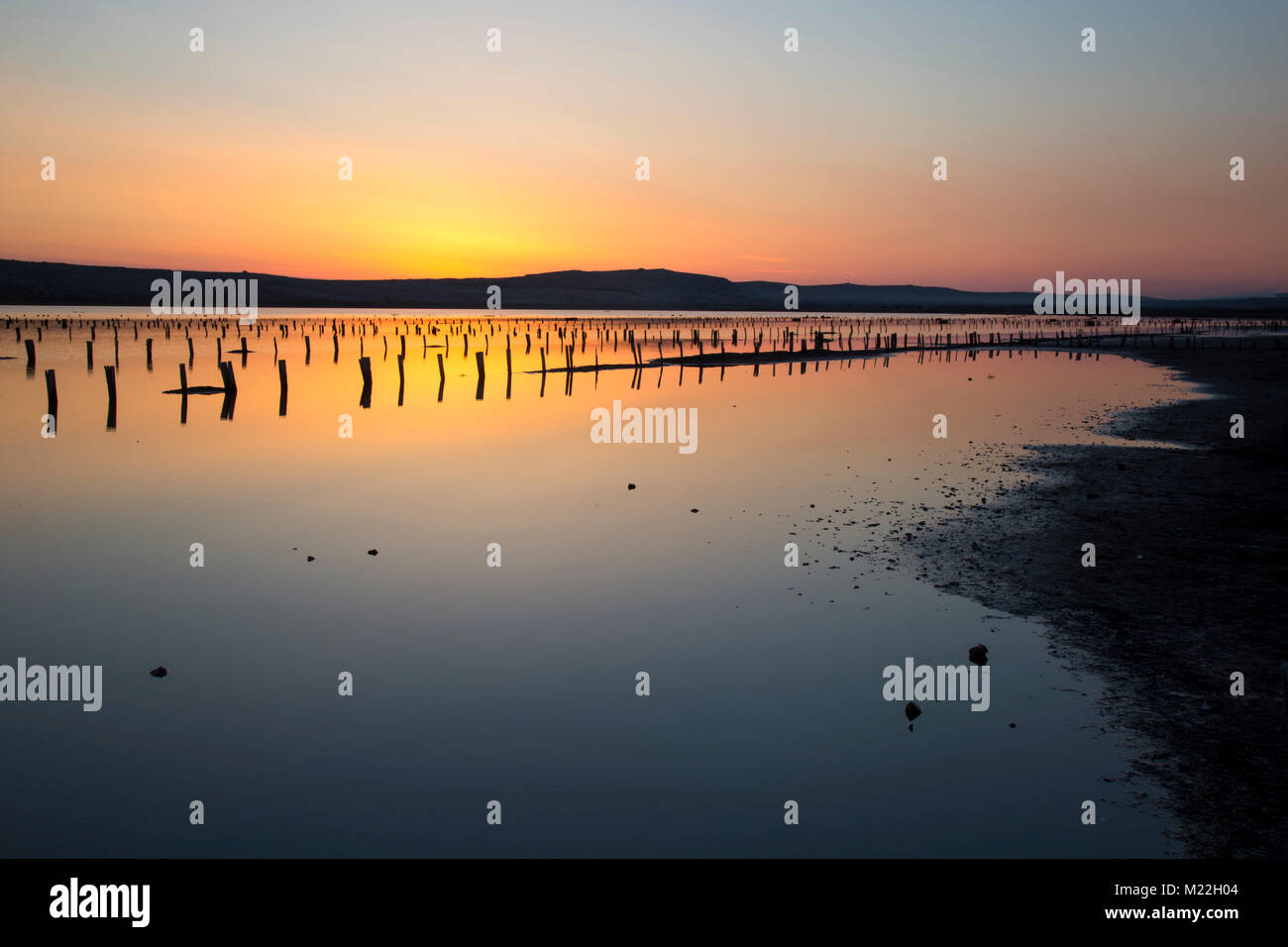 Old Saline with beautiful sunset - sea landscape - Salt production ...