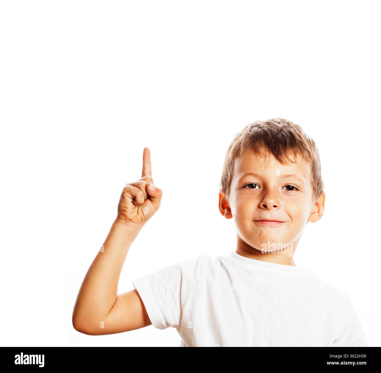 little cute boy pointing in studio isolated close up Stock Photo - Alamy