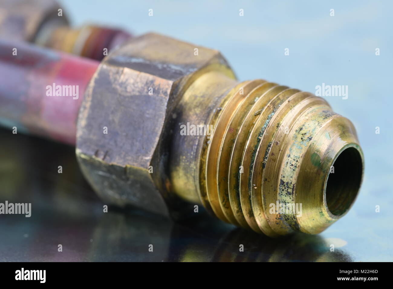 Copper pipe connector close-up Stock Photo - Alamy