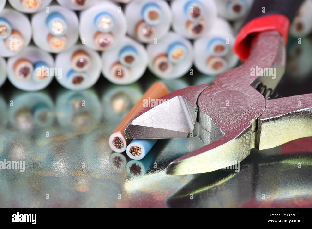 Electrical Tool and Cable Close-up on Metal Background Stock Photo - Alamy