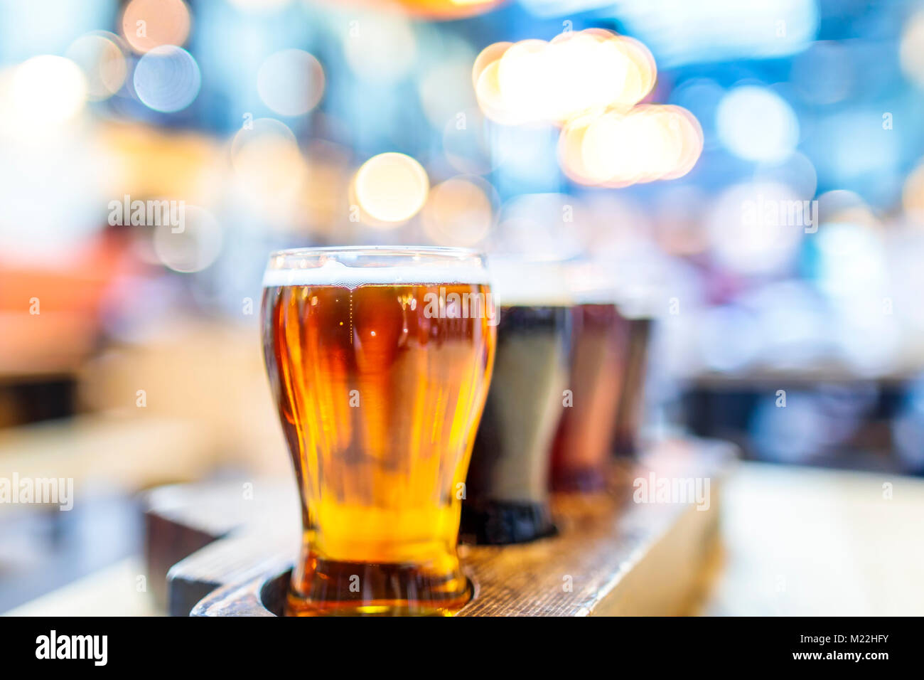 Flight of beer sampler, close up view Stock Photo - Alamy