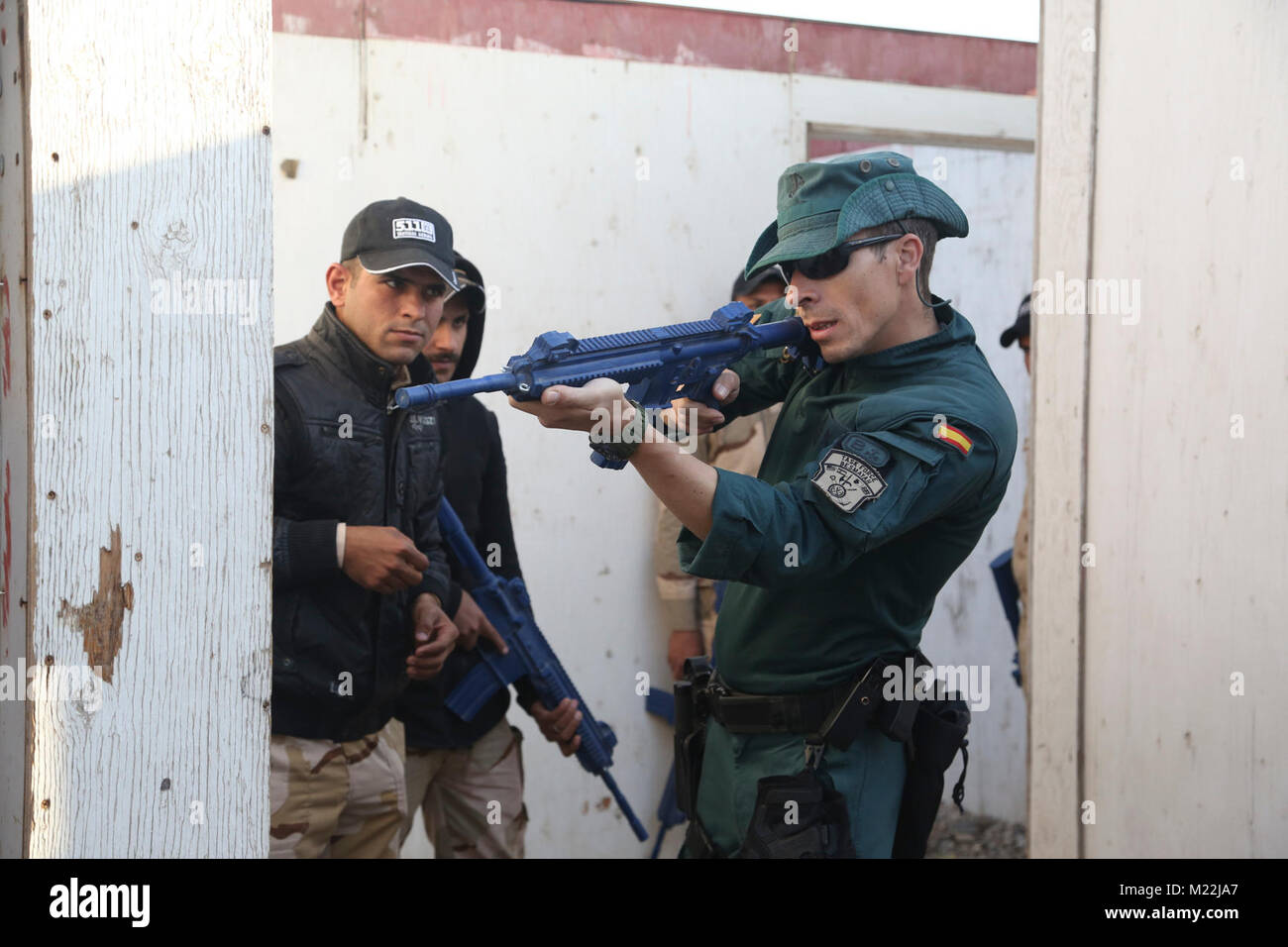 A Spanish Guardia Civil soldier properly demonstrates how to clear a ...