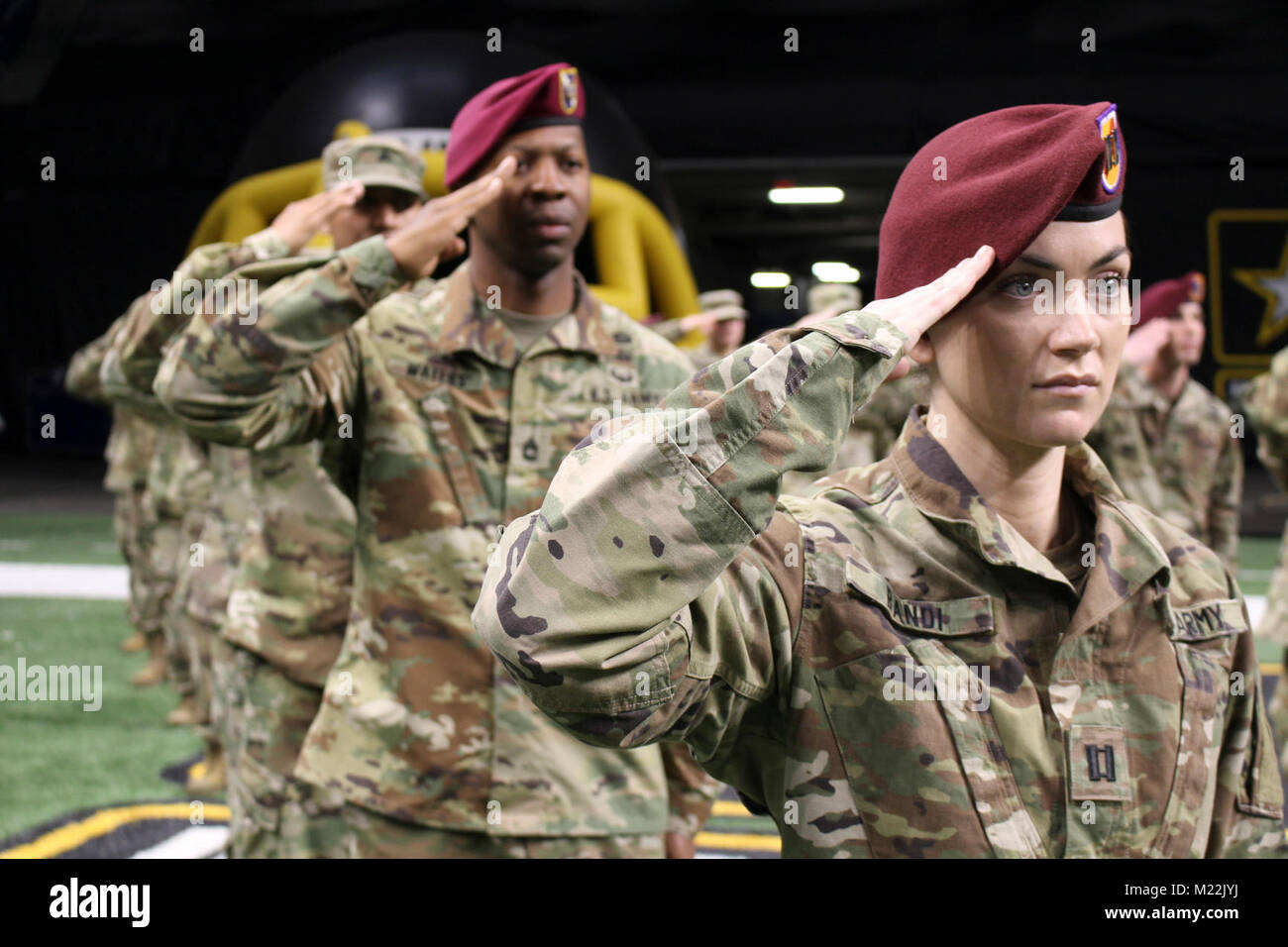 Soldiers stationed at Fort Bragg, N.C., salute the colors during an ...
