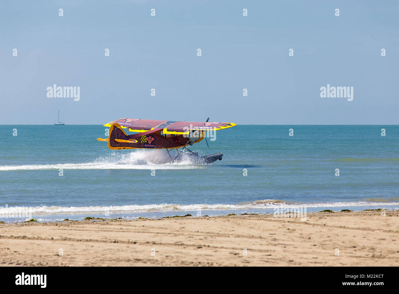 Ultralight amphibious aircraft landing on the sea coast - Air Show ...