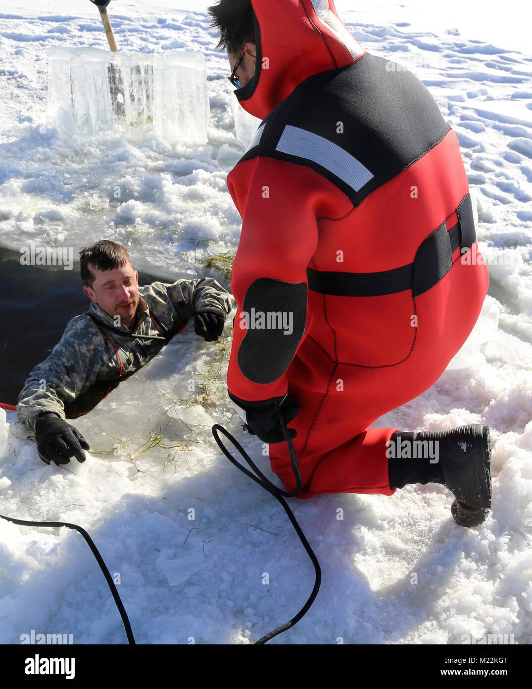 A Soldier participates in cold-water immersion training at an ice ...