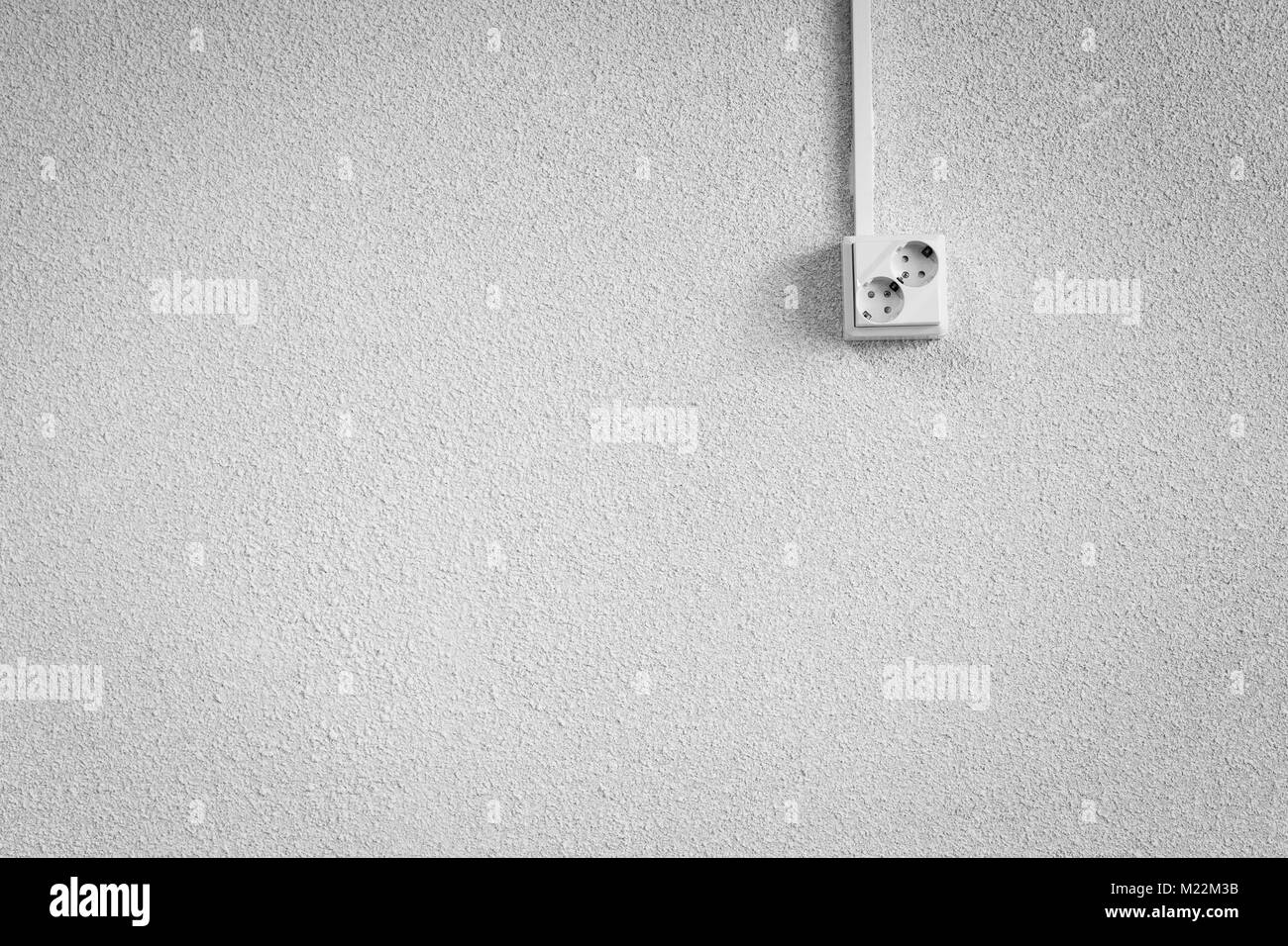 Socket on a white wall Stock Photo - Alamy