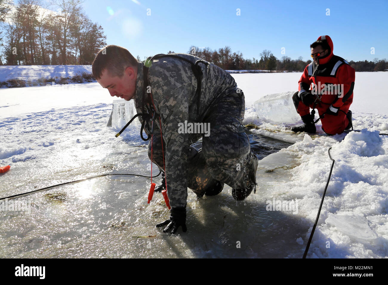 A Soldier participates in cold-water immersion training at an ice ...