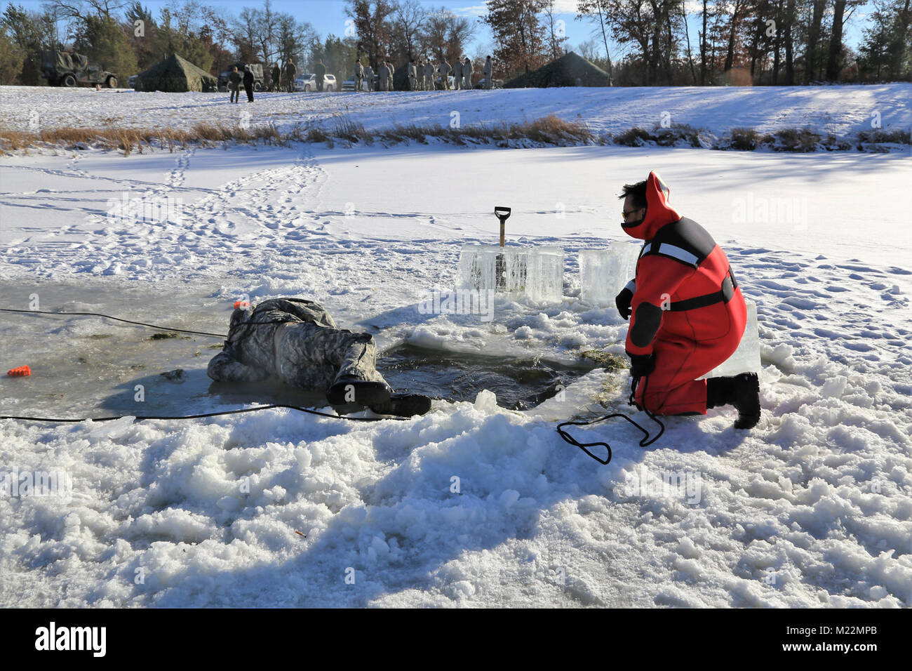 A Soldier participates in cold-water immersion training at an ice ...