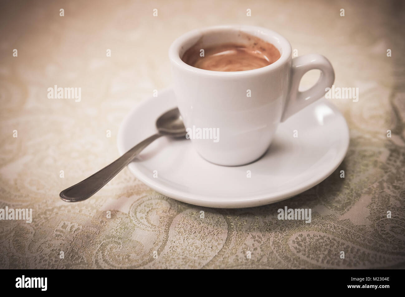 Small white cup of espresso coffee, vintage stylized photo Stock Photo ...