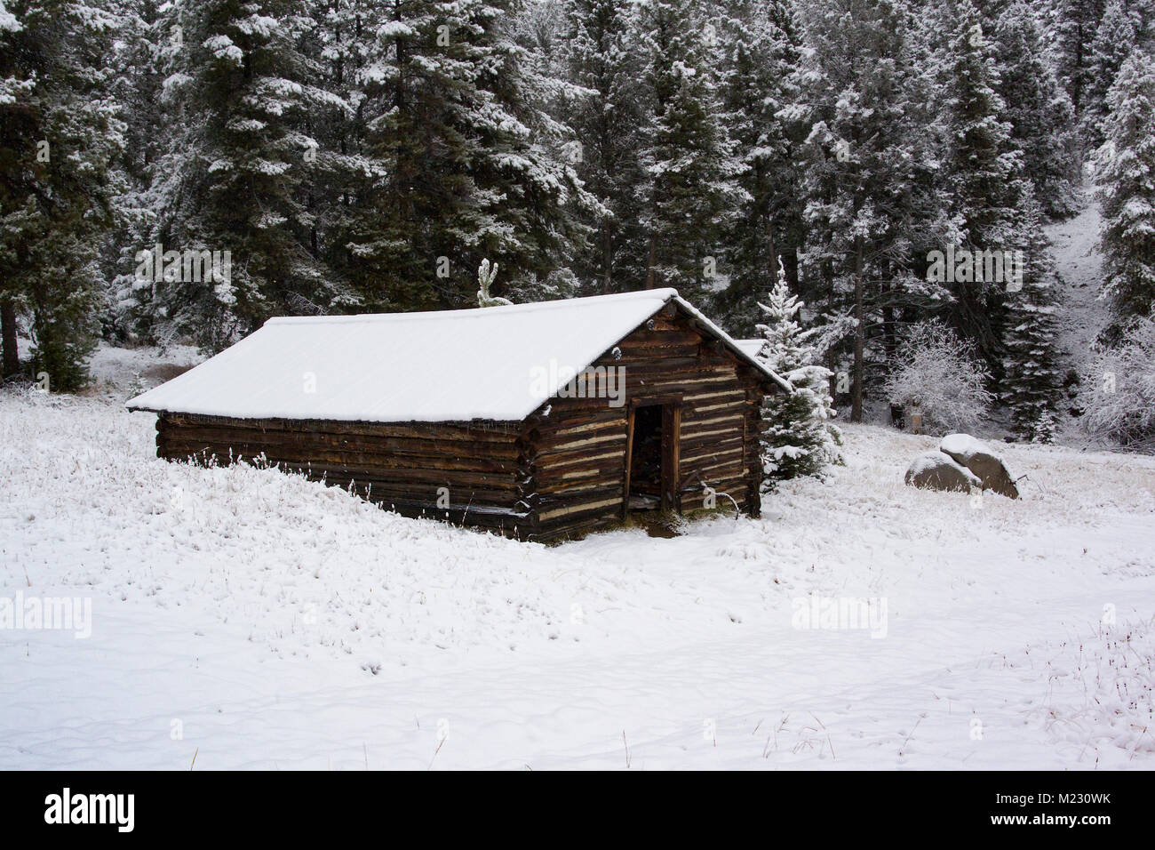 Snow covered cabin in an old western ghost town hi-res stock ...