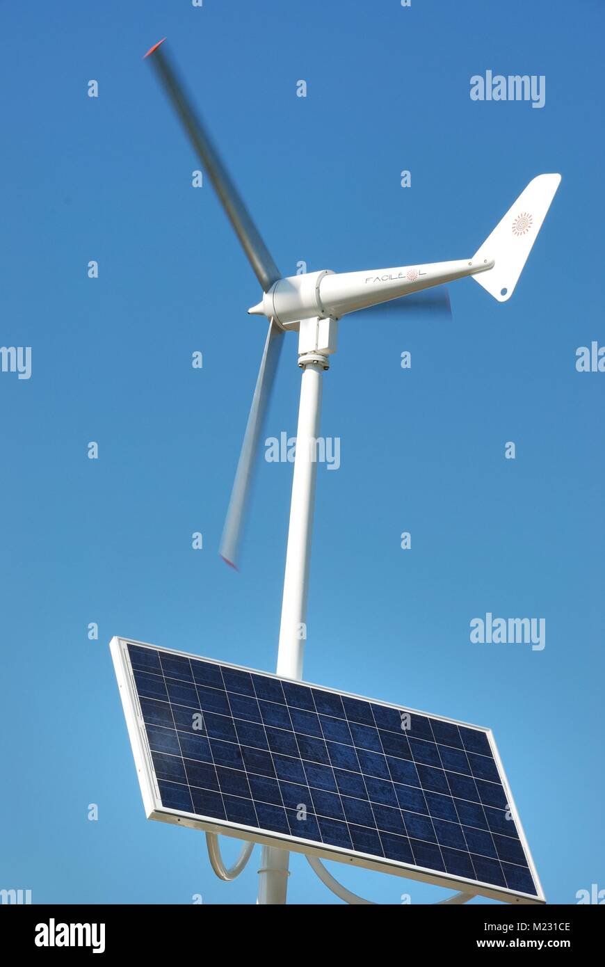 Wind turbine and solar panel Stock Photo - Alamy