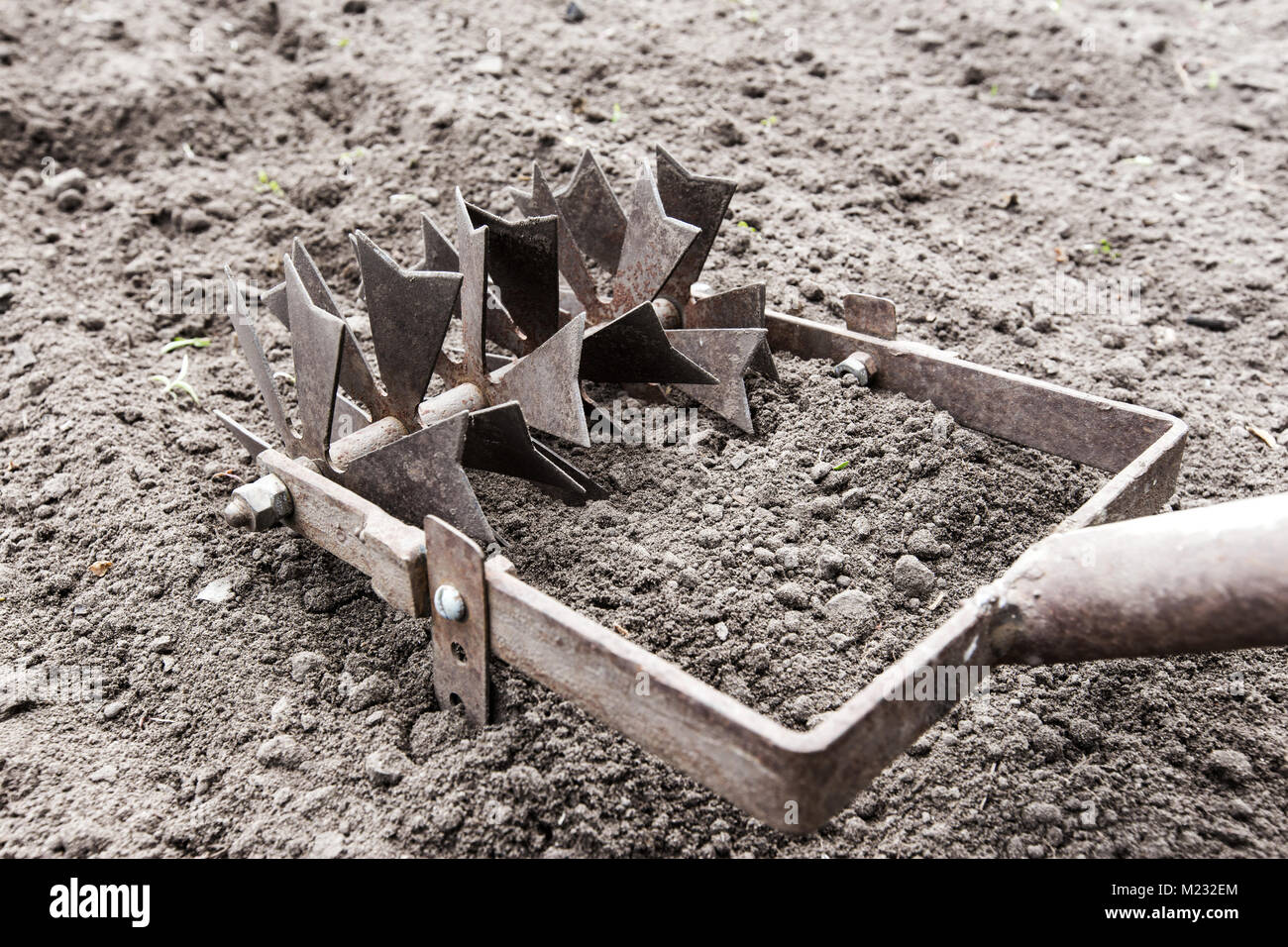 manual plow on the ground Stock Photo - Alamy
