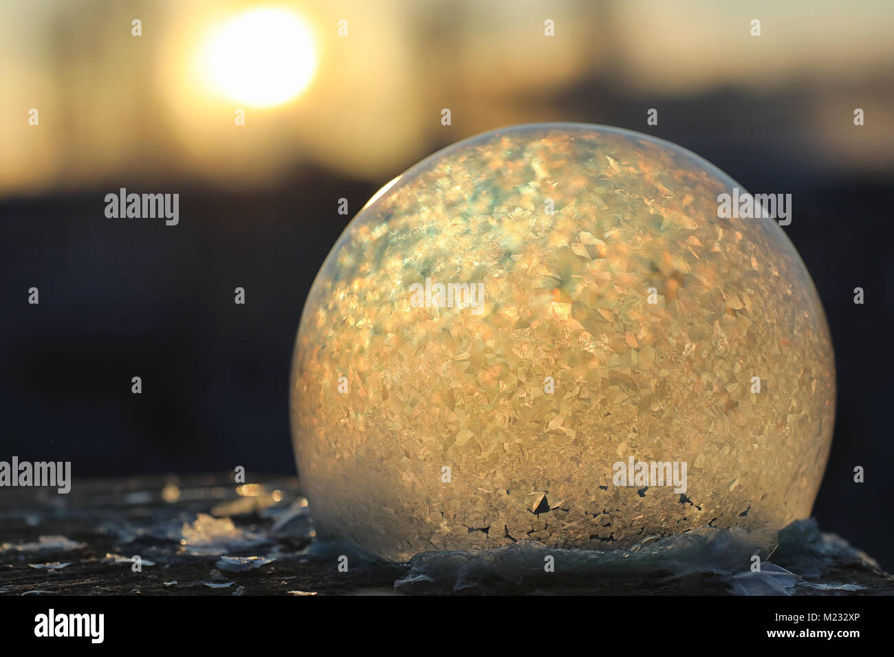 Soap bubbles freeze in the cold. Winter soapy water freezes in t Stock ...