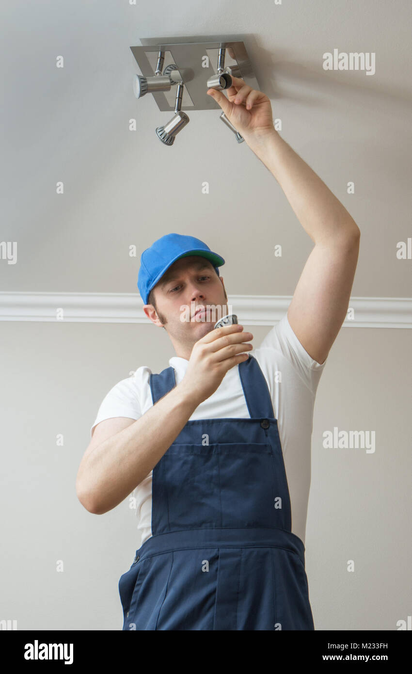 Changing light bulb hi-res stock photography and images - Alamy