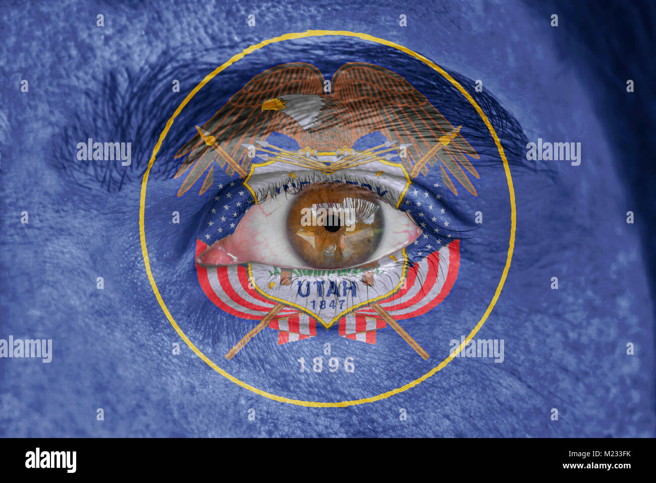 Human face and eye painted with US state flag of Utah Stock Photo - Alamy