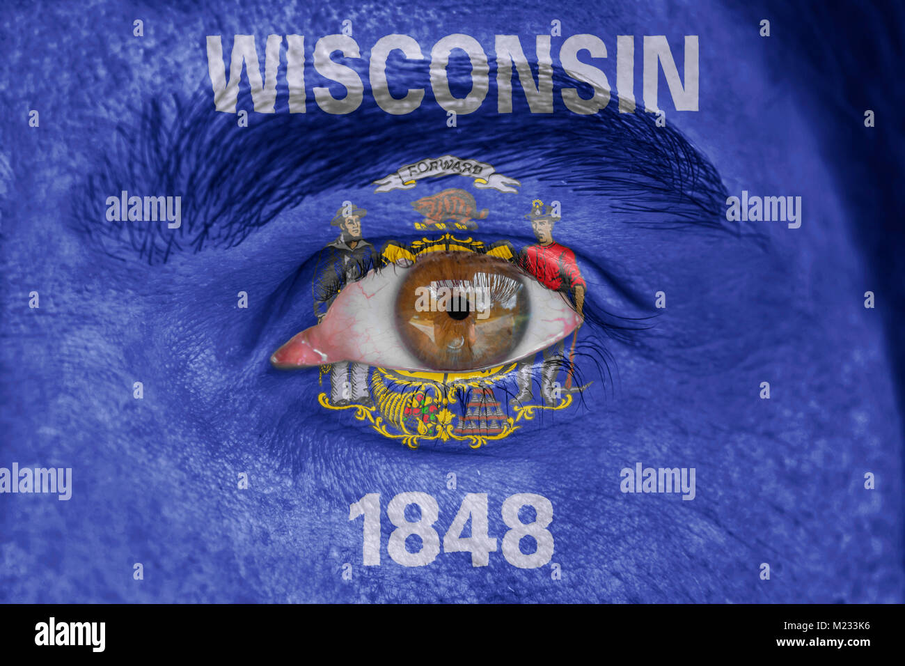 Human face and eye painted with US state flag of Wisconsin Stock Photo ...