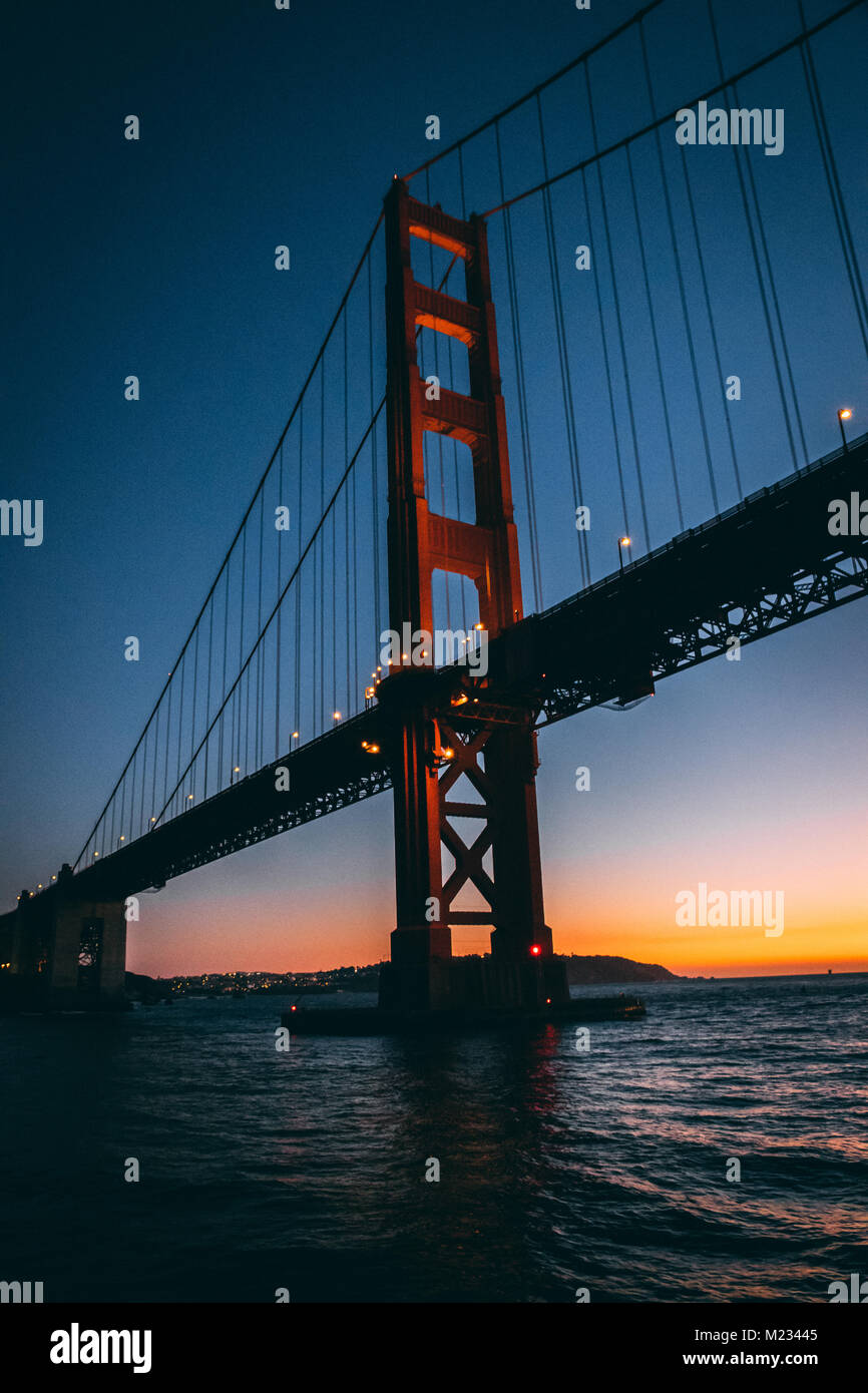 Golden Gate Bridge From Water Level at Sunset Stock Photo - Alamy