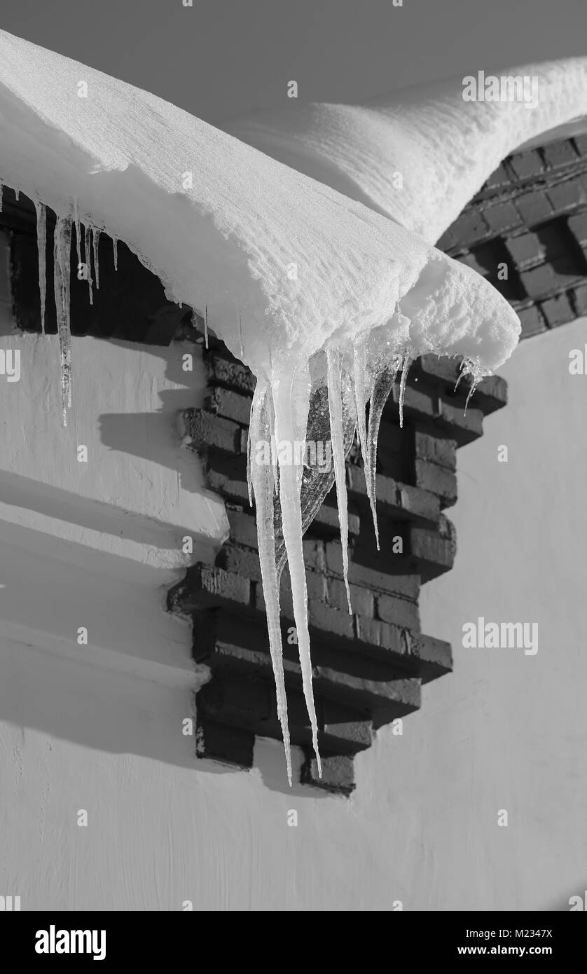 Photo of a macro of long icicles illuminated by the sun Stock Photo - Alamy