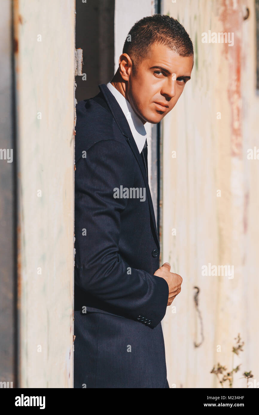 Handsome man in black suit and sunglasses. Secret agent, mafia ...