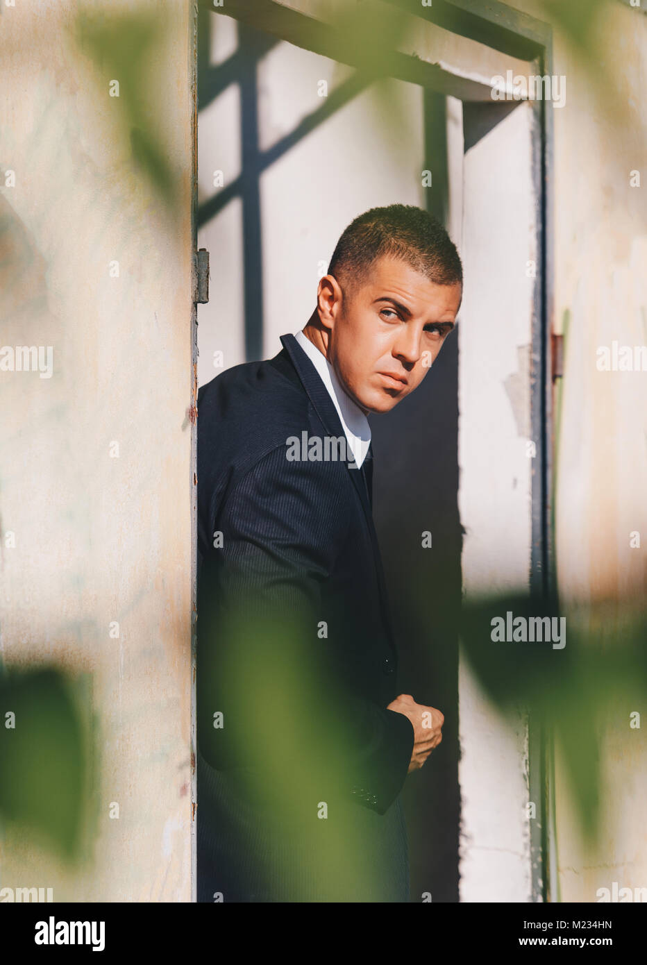 Handsome man in black suit and sunglasses. Secret agent, mafia ...