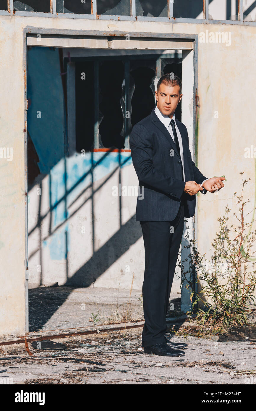 Handsome man in black suit and sunglasses. Secret agent, mafia ...
