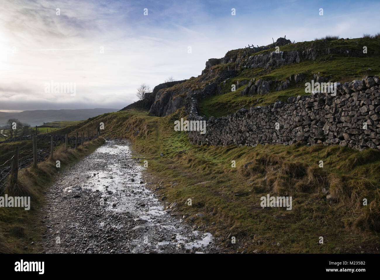 An icy path along the Pennine Way route during winter in the Yorkshire ...