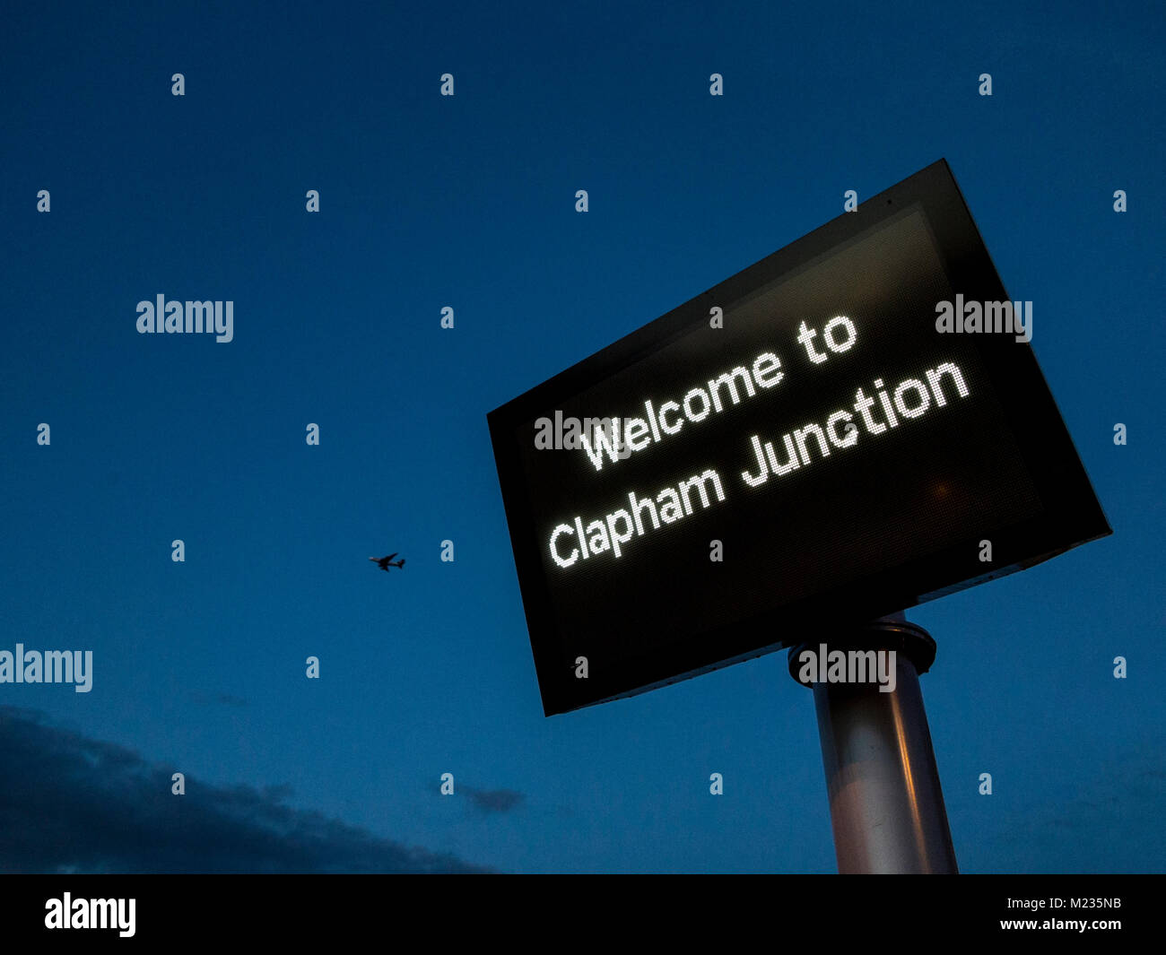 A 'Welcome to Clapham Junction' electronic noticeboard Stock Photo - Alamy