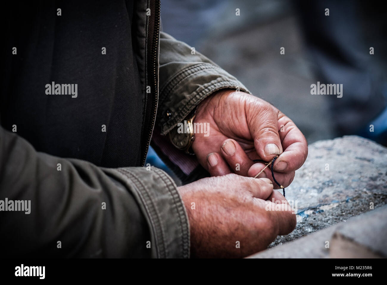 Old aged man working hi-res stock photography and images - Alamy