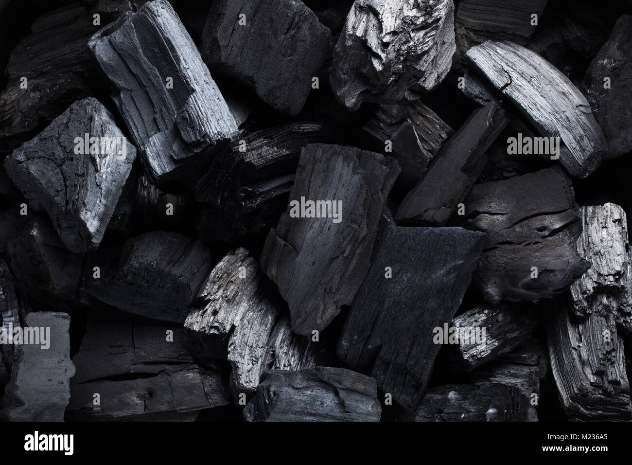 Coal mineral black as a cube stone background Stock Photo - Alamy