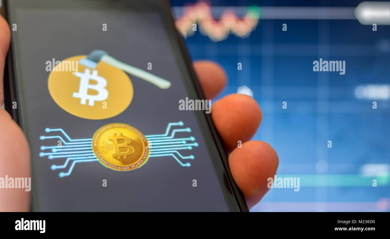 Bitcoin logo with ax on phone screen, concept edited Stock Photo - Alamy
