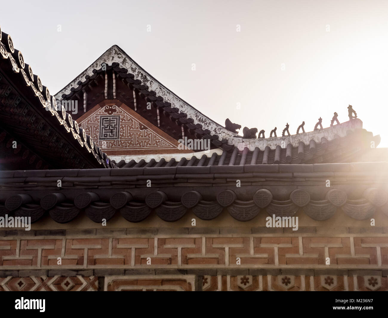 Korean traditional roof in the rays of light. Gyeongbokgung Palace ...