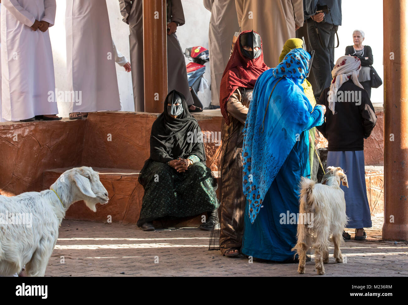 Nizwa, Oman, Febrary 2nd, 2018: omani women at a goat market Stock ...