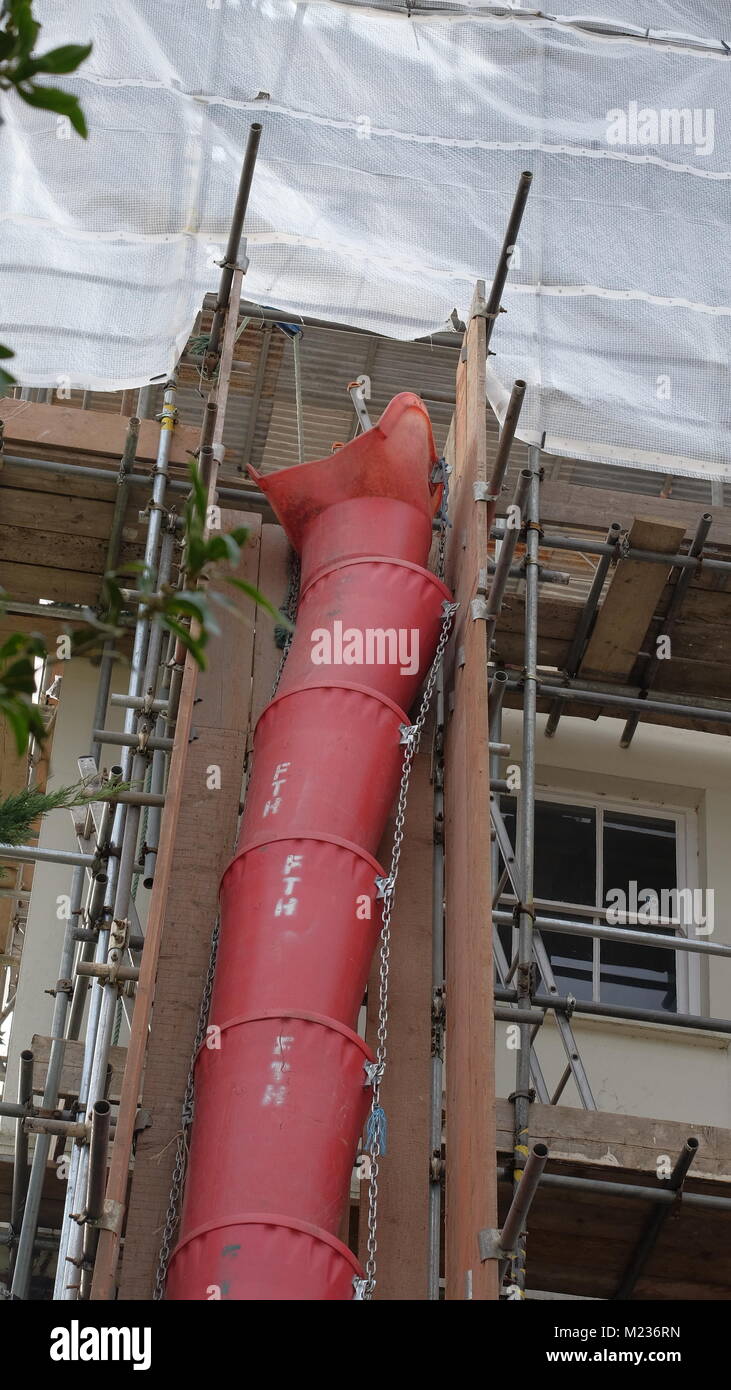 red chute for scaffold Stock Photo - Alamy