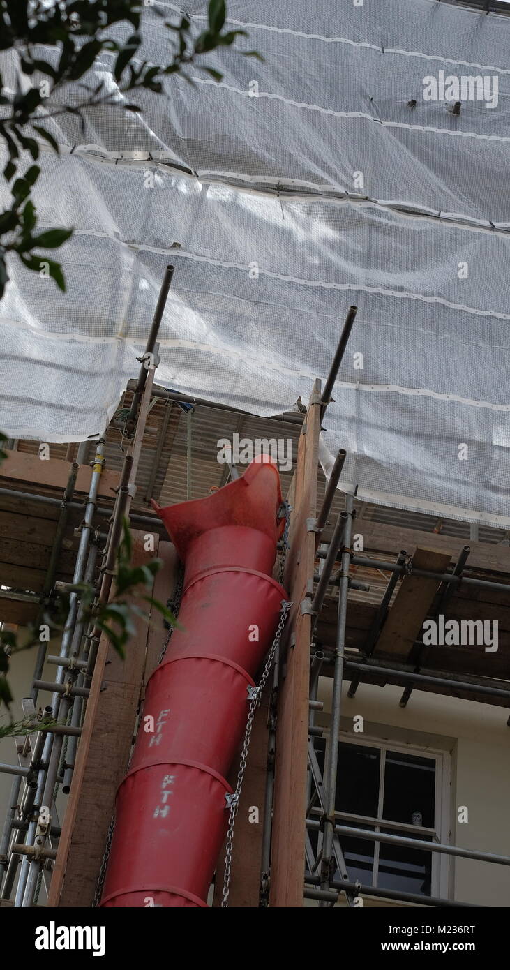 red chute for scaffold Stock Photo - Alamy