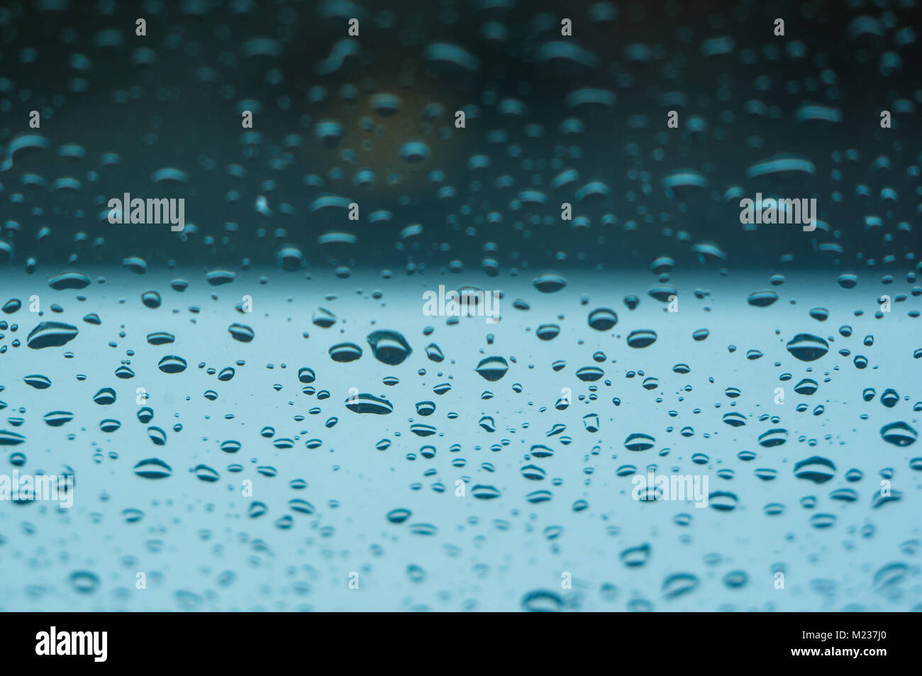 raindrops on the window glass, toned, close up Stock Photo - Alamy