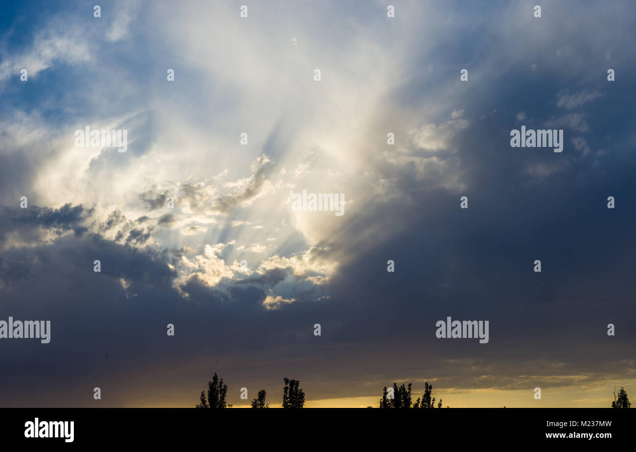 Landscape with dramatic light - beautiful golden sunset with saturated ...