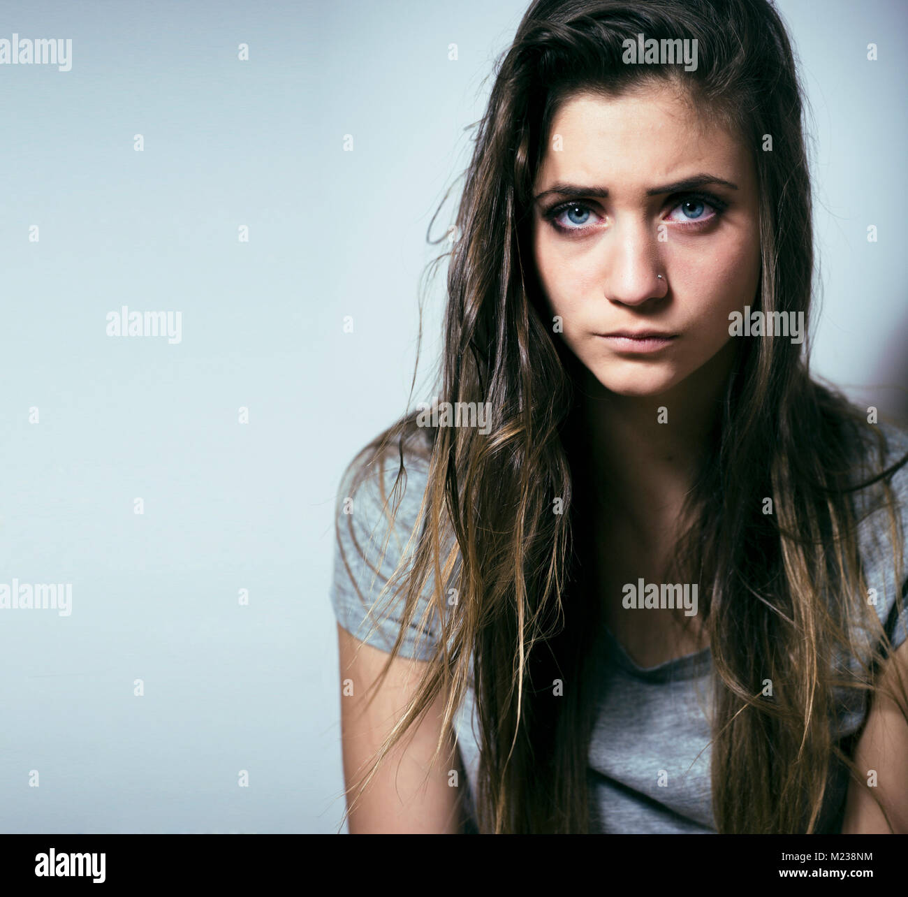 problem depressioned teenage with messed hair and sad face, real Stock ...
