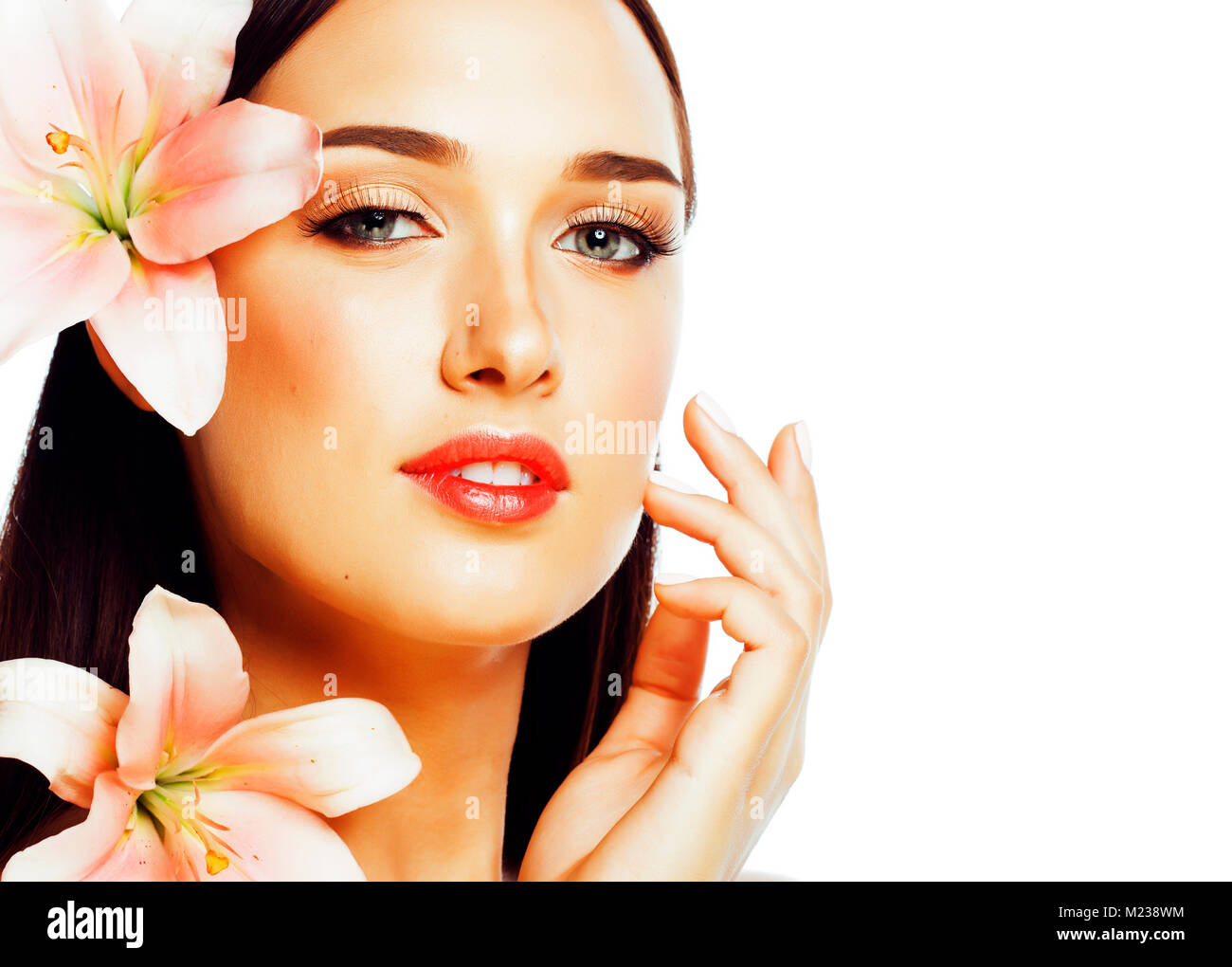 young attractive lady close up with hands on face isolated flowe Stock ...