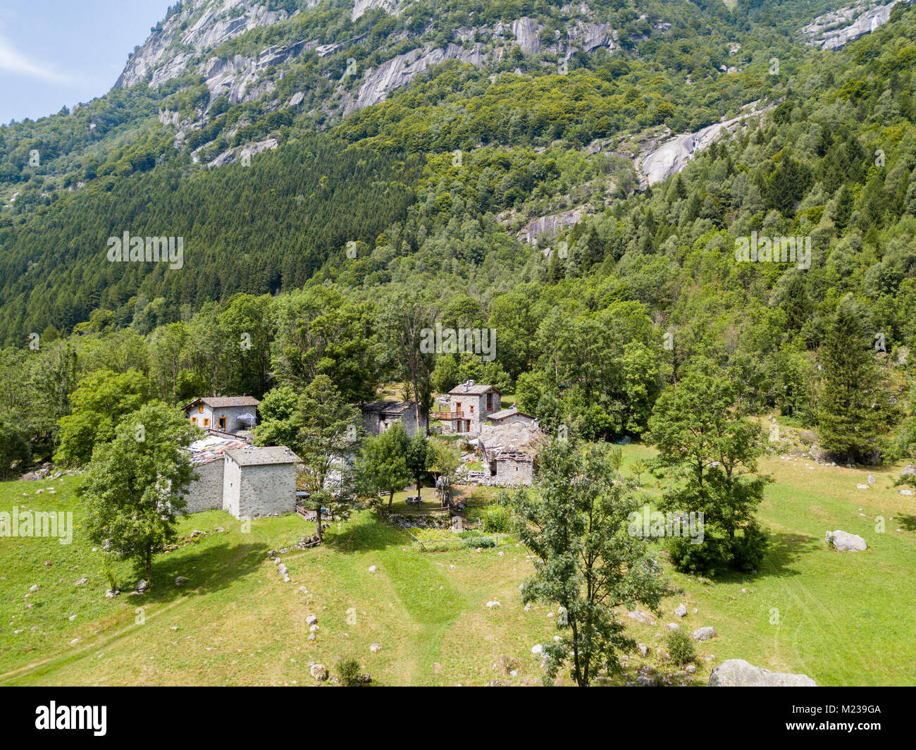 Aerial view of the Mello Valley, Val di Mello, a green valley with ...