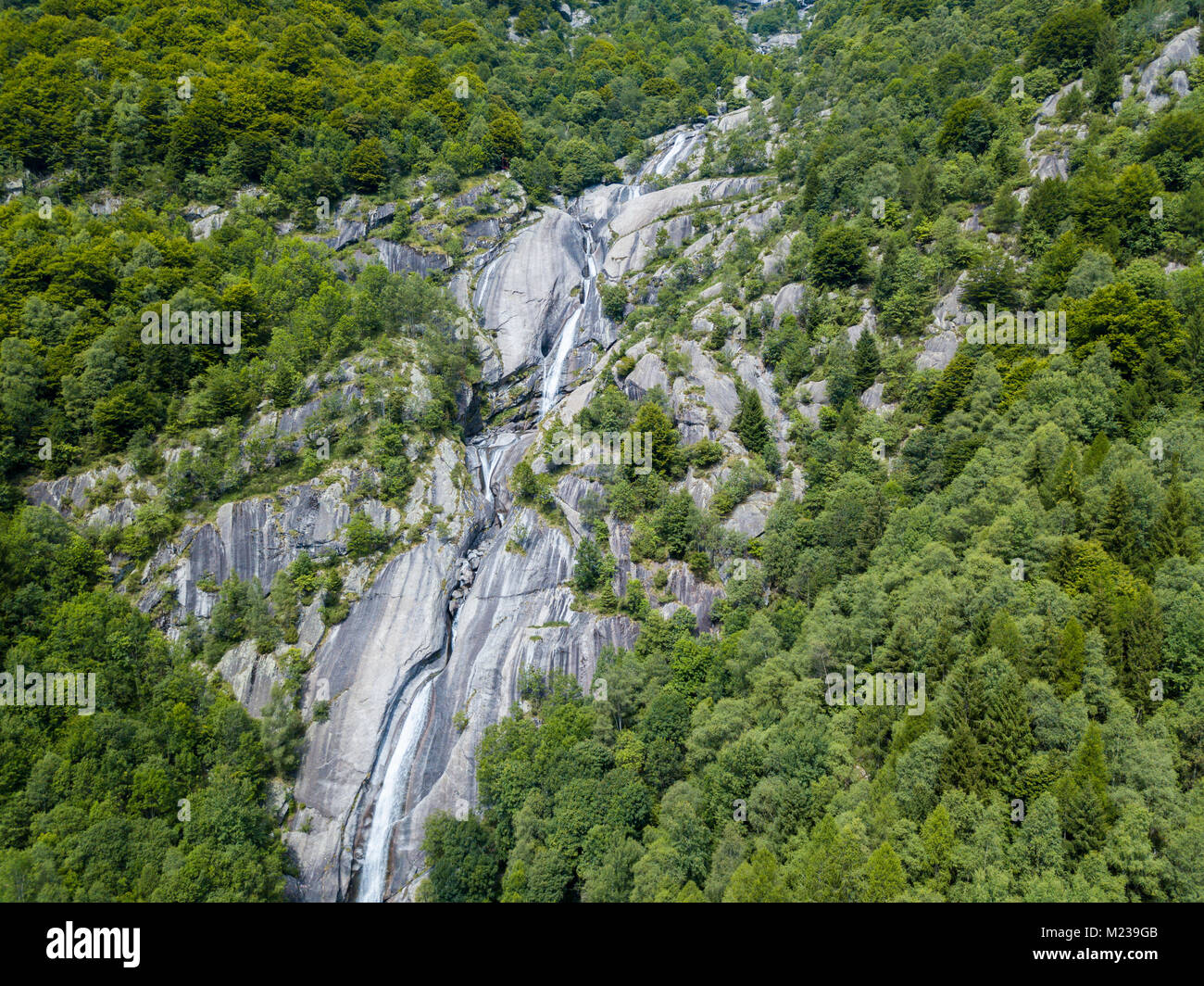 Valley waterfall surrounded mountains hi-res stock photography and ...