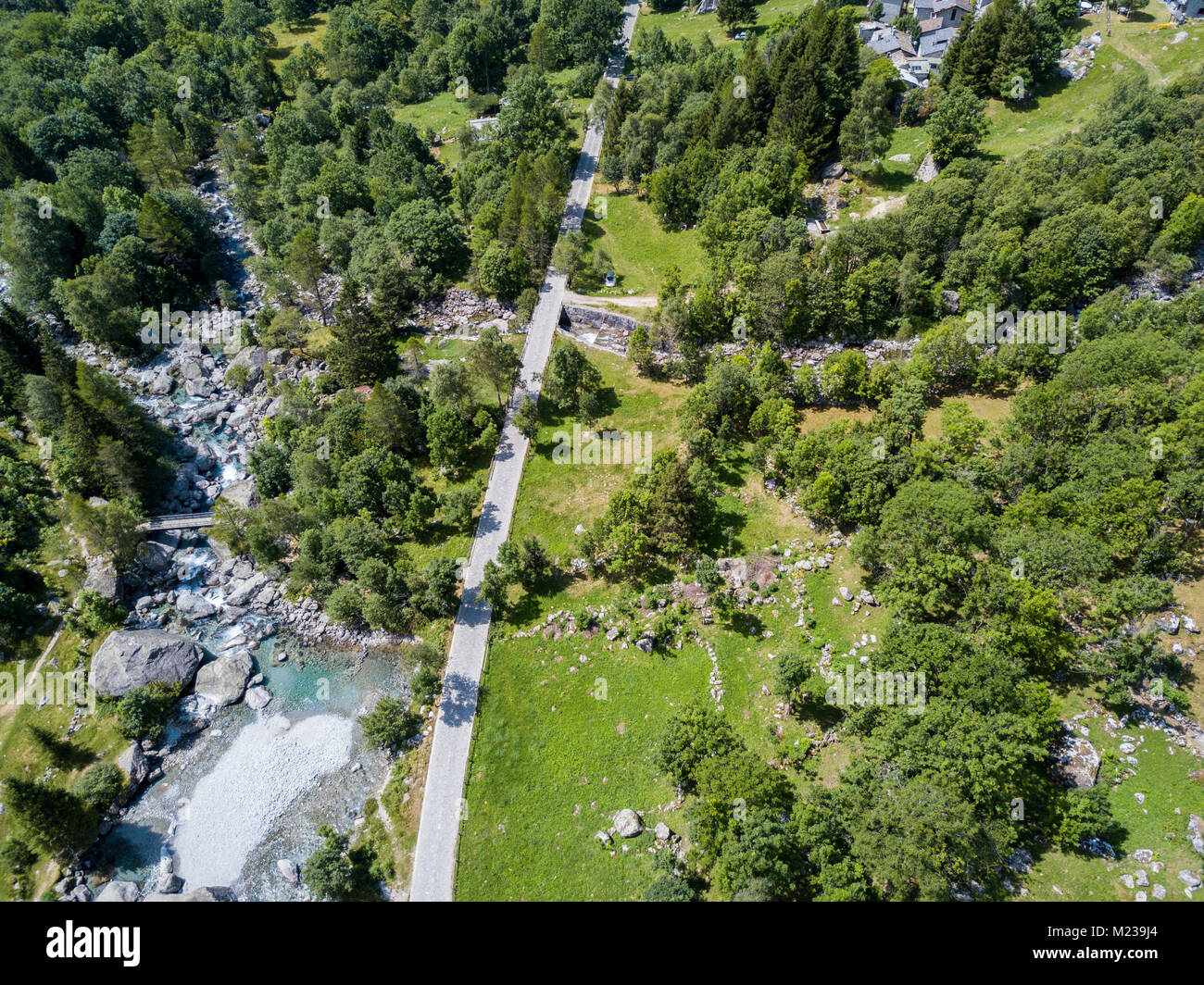 Aerial view of the Mello Valley, Val di Mello, a green valley with ...