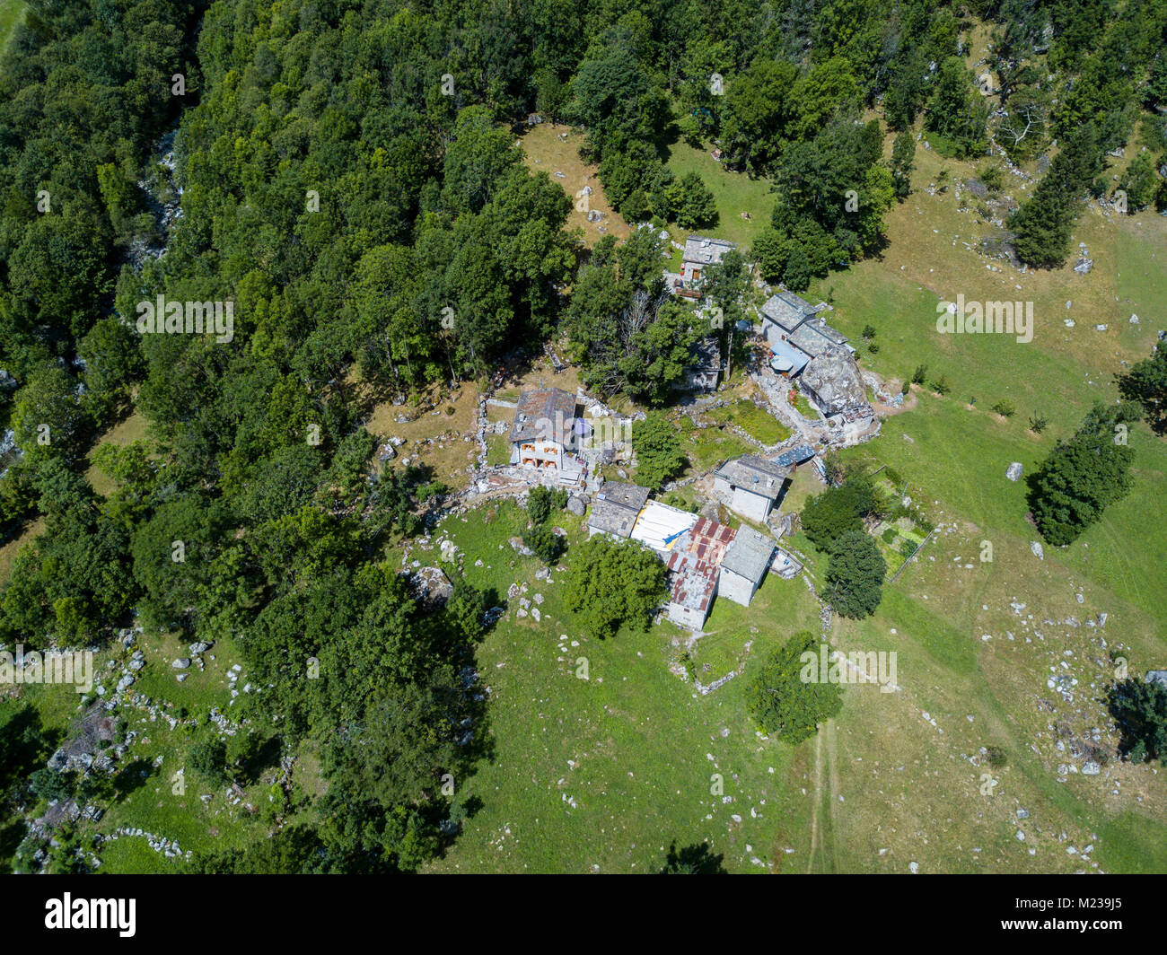 Aerial view of the Mello Valley, Val di Mello, a green valley with ...