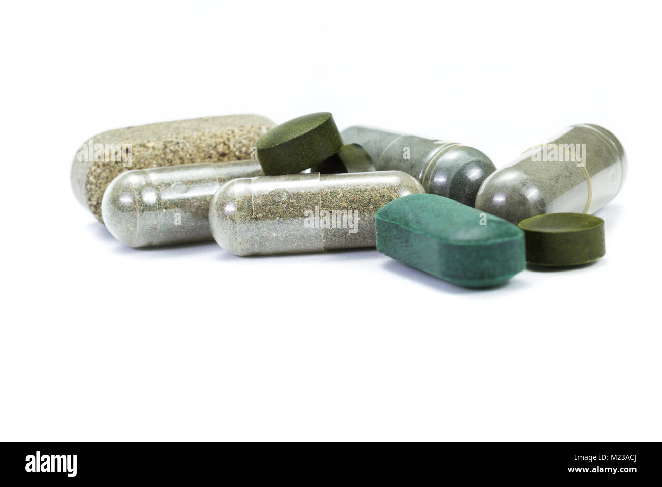 group of natural super food blend of nutrient rich health food capsules ...