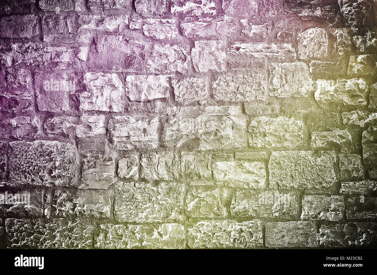 Rough textured limestone brick wall background Stock Photo - Alamy