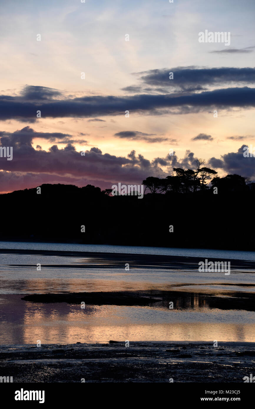 Raglan Beach as the sunset starts to turn pink Stock Photo - Alamy